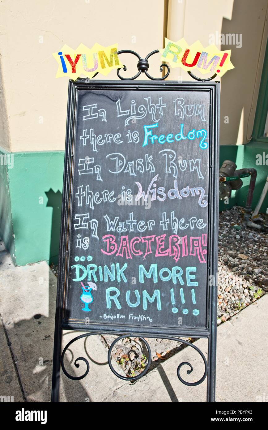 Drink more rum sign posted outside a rum distillery in Key West ...