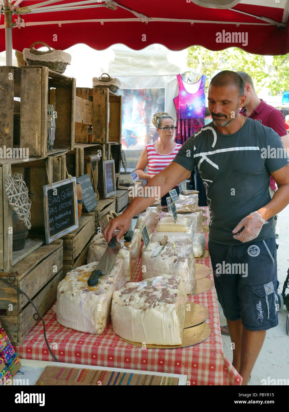 Colourful busy market at Saint Chinian french market Stock Photo - Alamy
