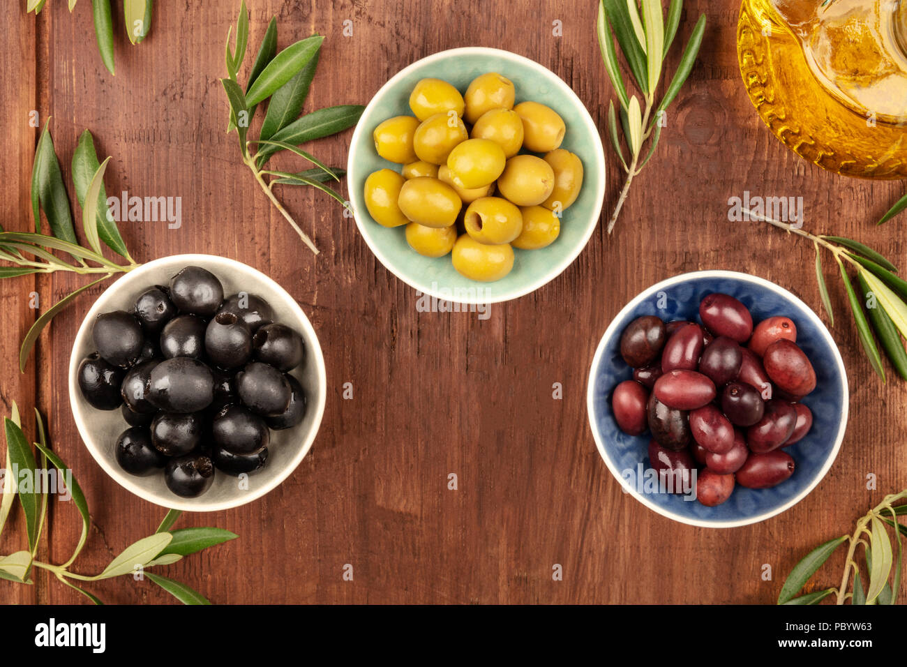 Overhead photo of various olives in bowls with copy space Stock Photo ...