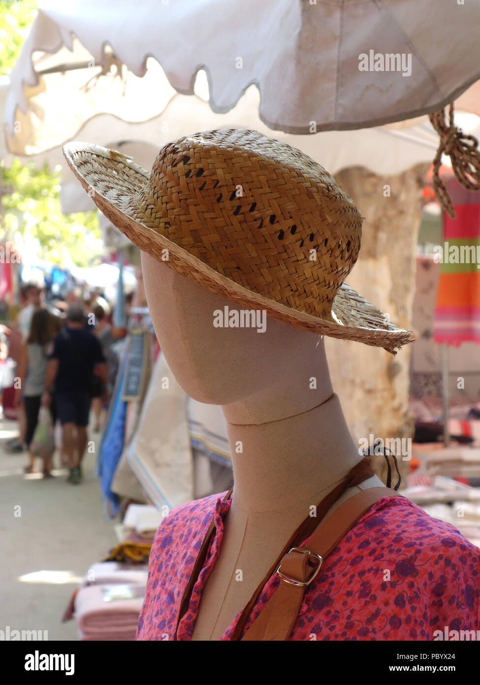 Colourful busy market at Saint Chinian Stock Photo - Alamy