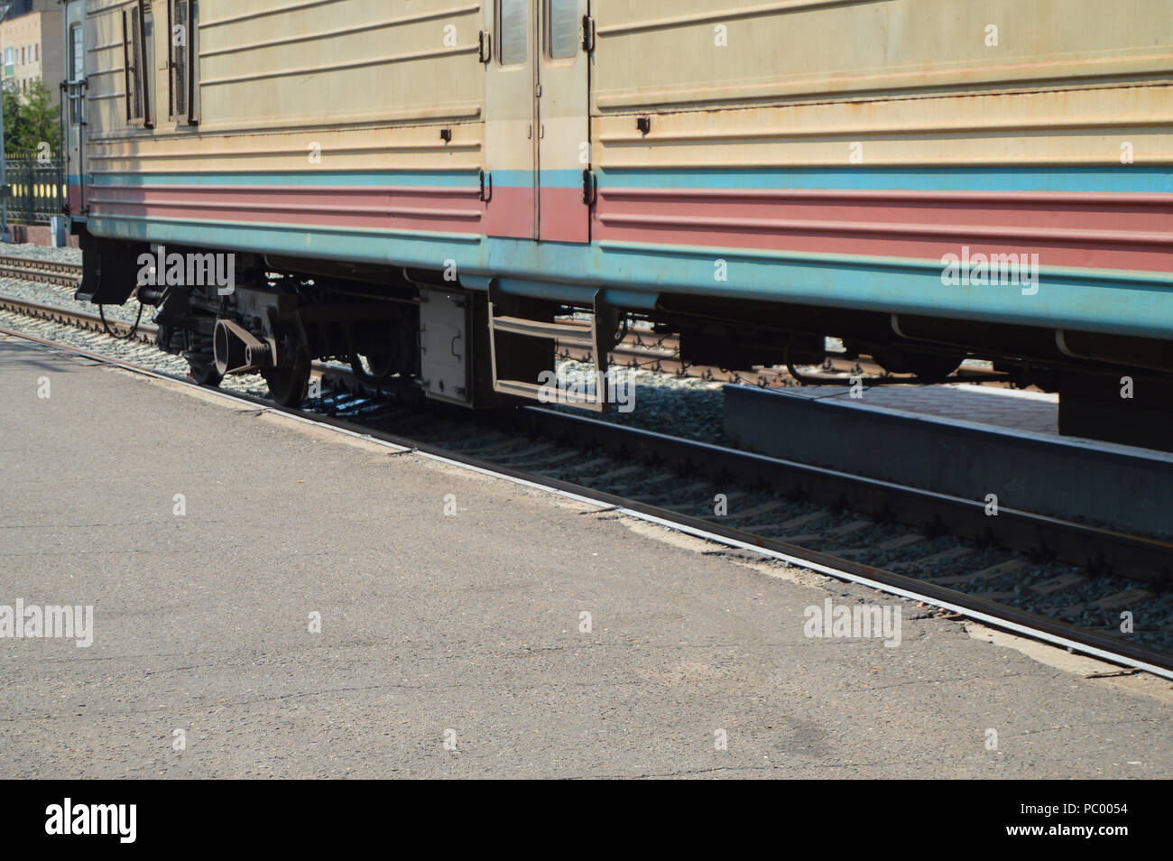 An old Luggage car for transportation of cargo stands on the platform ...