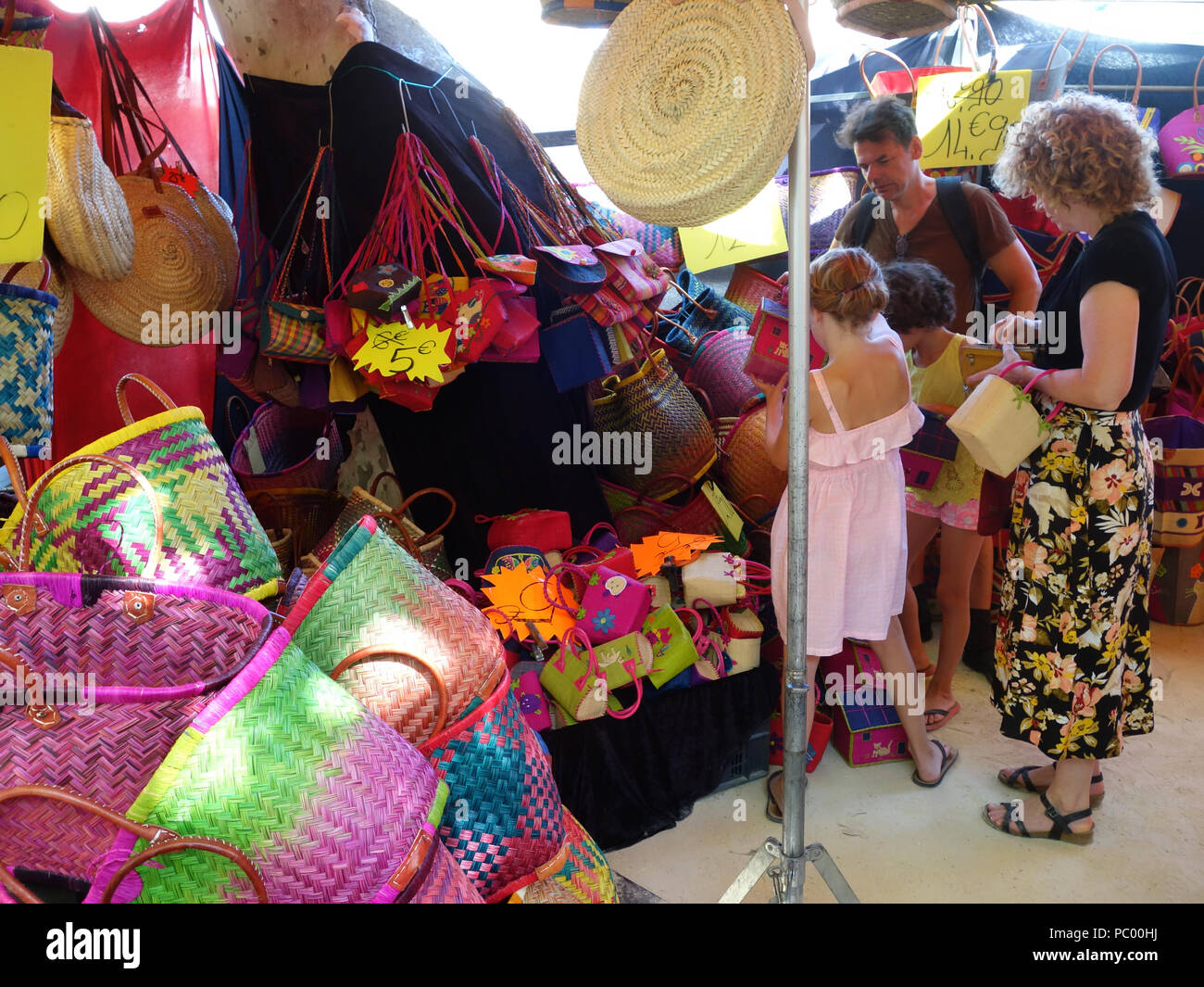Colourful busy market at Saint Chinian french market Stock Photo - Alamy