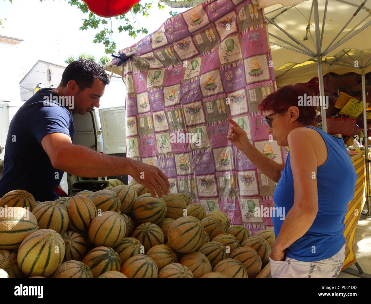 Colourful busy market at Saint Chinian french market Stock Photo - Alamy