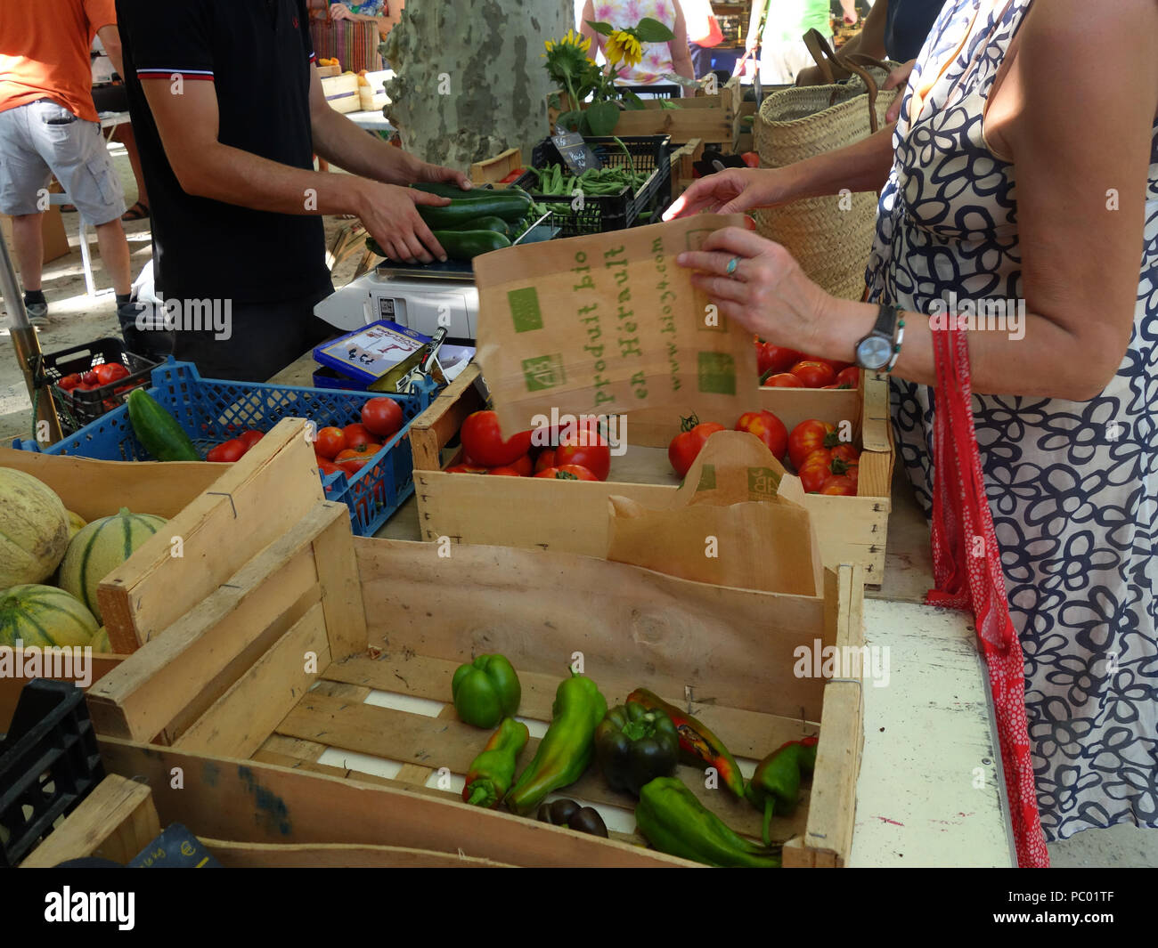 Colourful busy market at Saint Chinian french market Stock Photo - Alamy