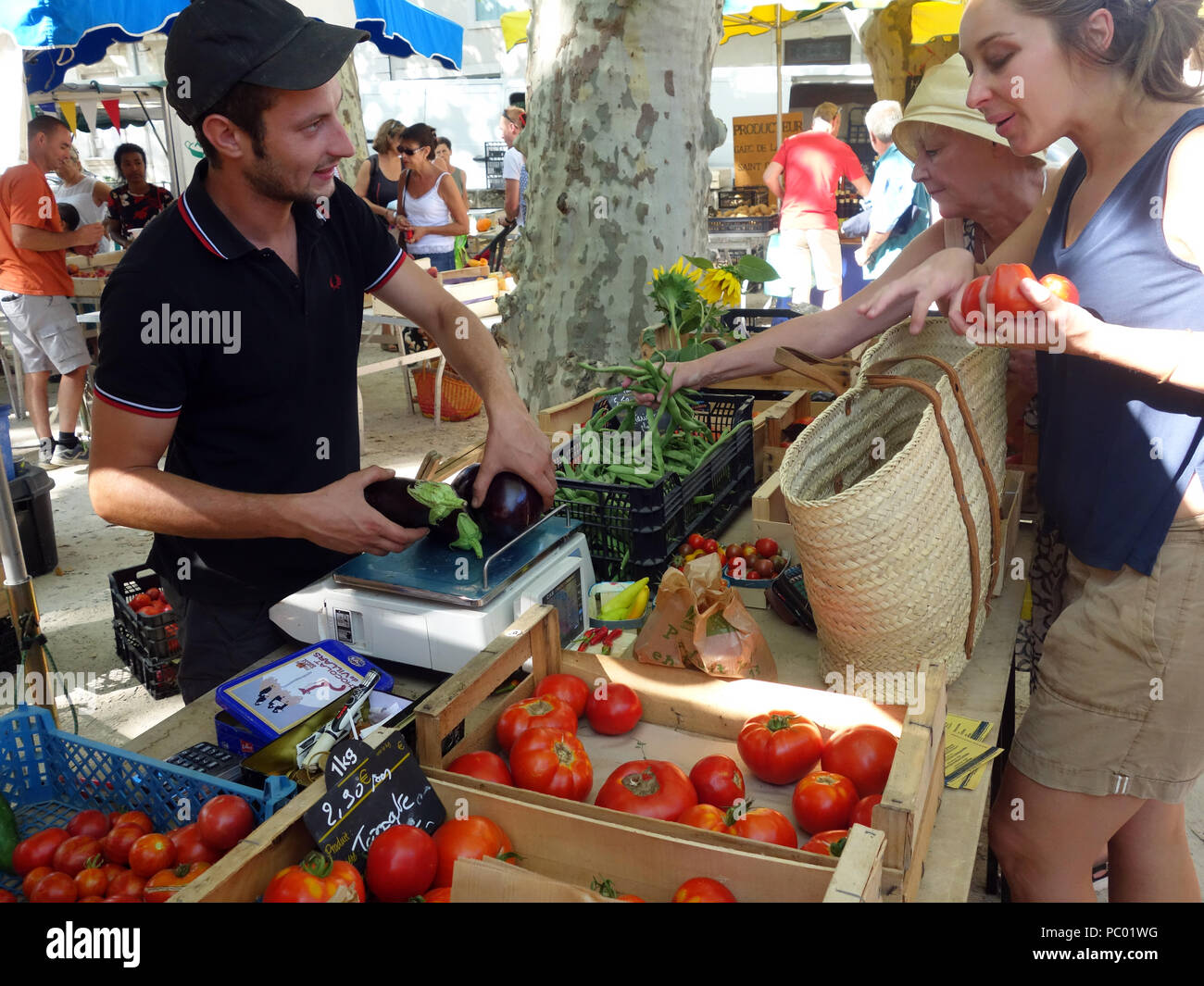 Colourful busy market at Saint Chinian french market Stock Photo - Alamy