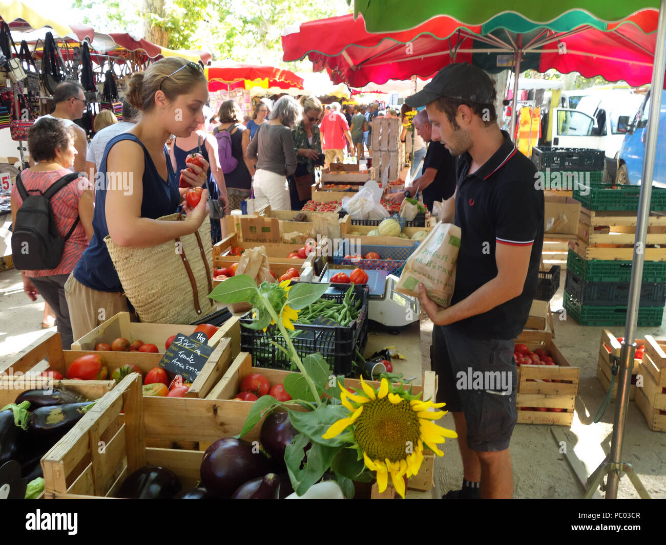 Colourful busy market at Saint Chinian french market Stock Photo - Alamy