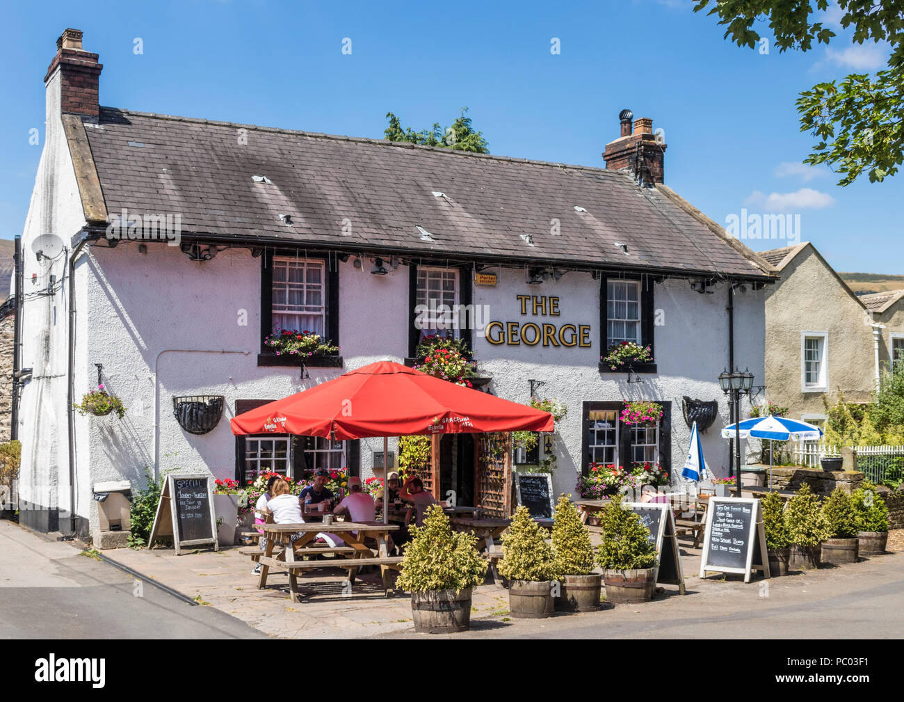 Castleton village centre people outside the george public house ...