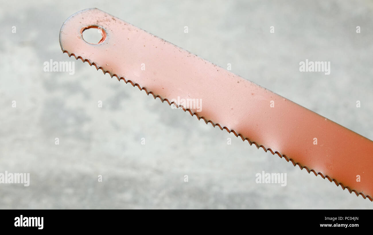 Close up of a hacksaw blade with some rust in it Stock Photo - Alamy