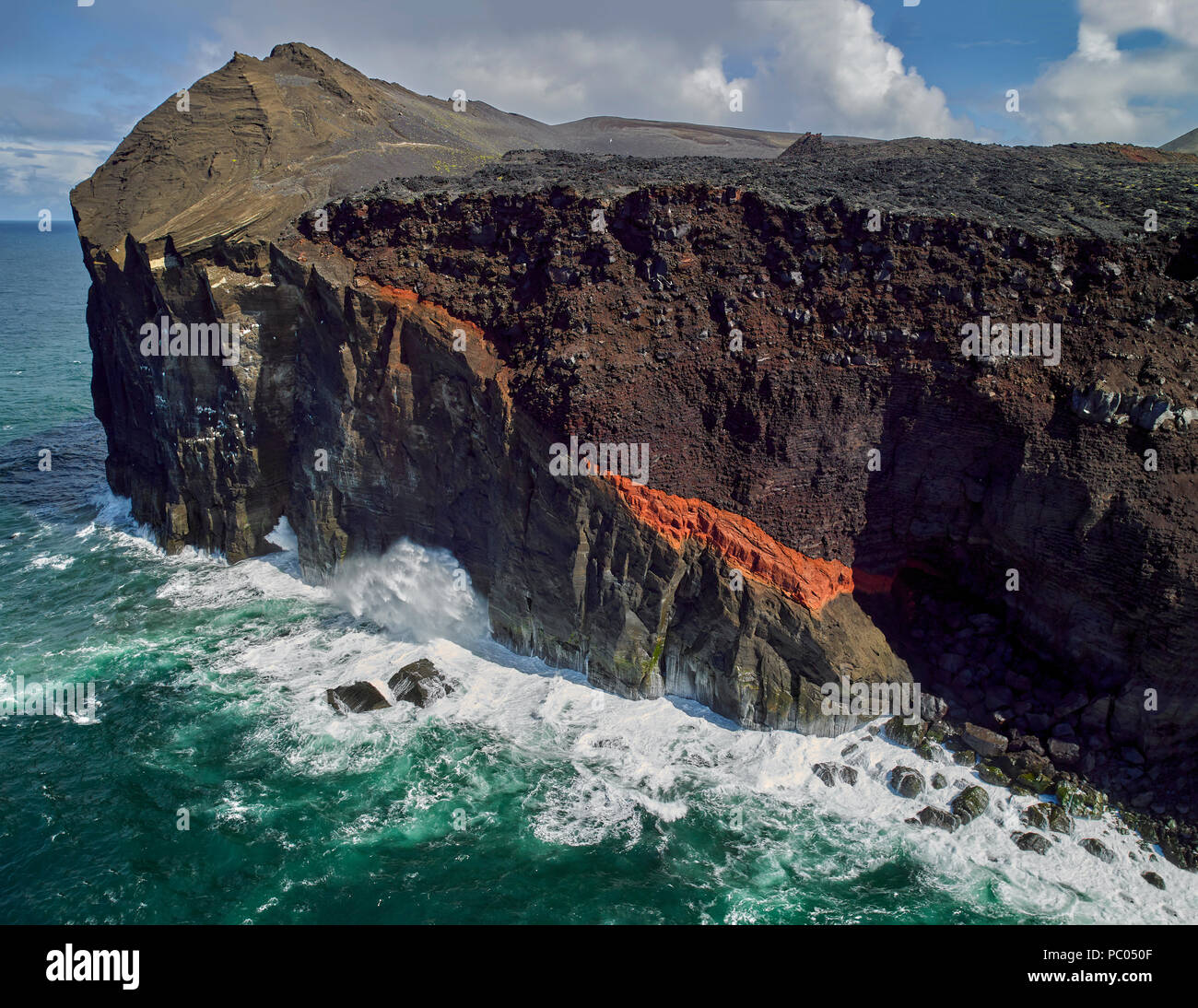 Waves crashing along the coast, Surtsey Island, Westman Islands ...