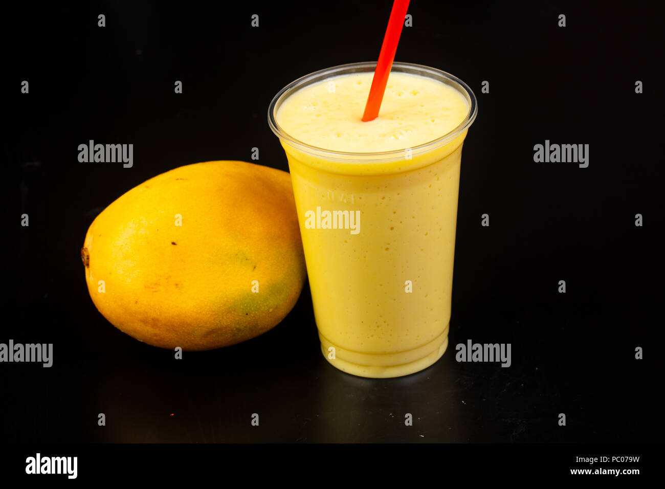 Sweet cold mango shake juice Stock Photo - Alamy