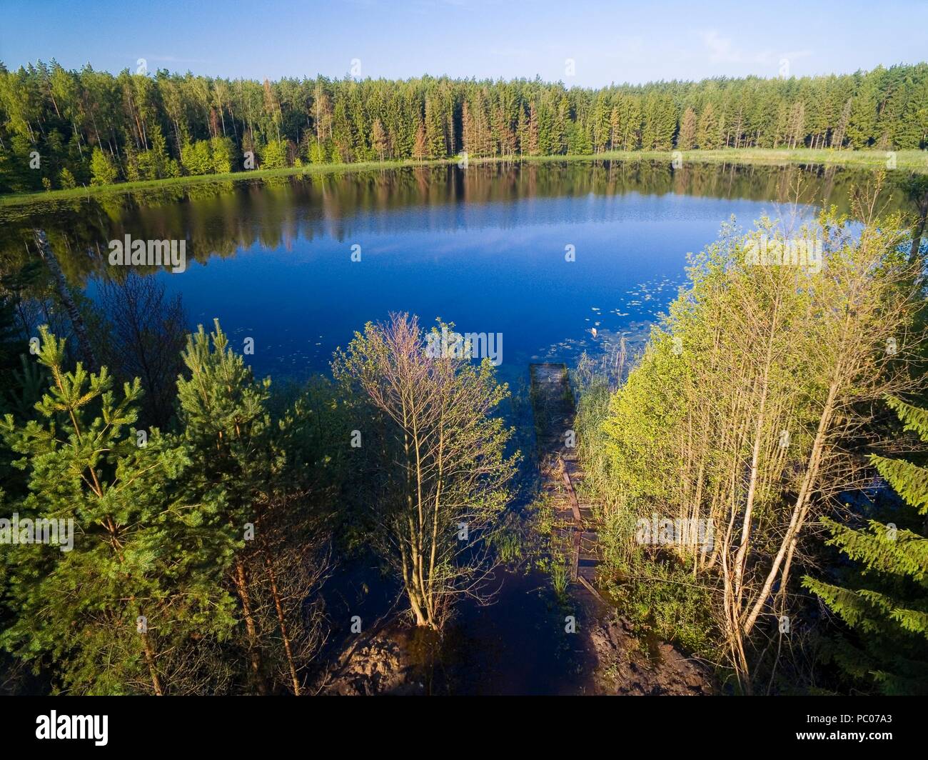 Aerial view of beautiful landscape of Mazury region, small lake in a ...