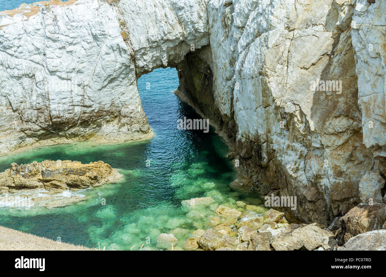The rock formations and arches as viewed from the Trearddur Bay to ...