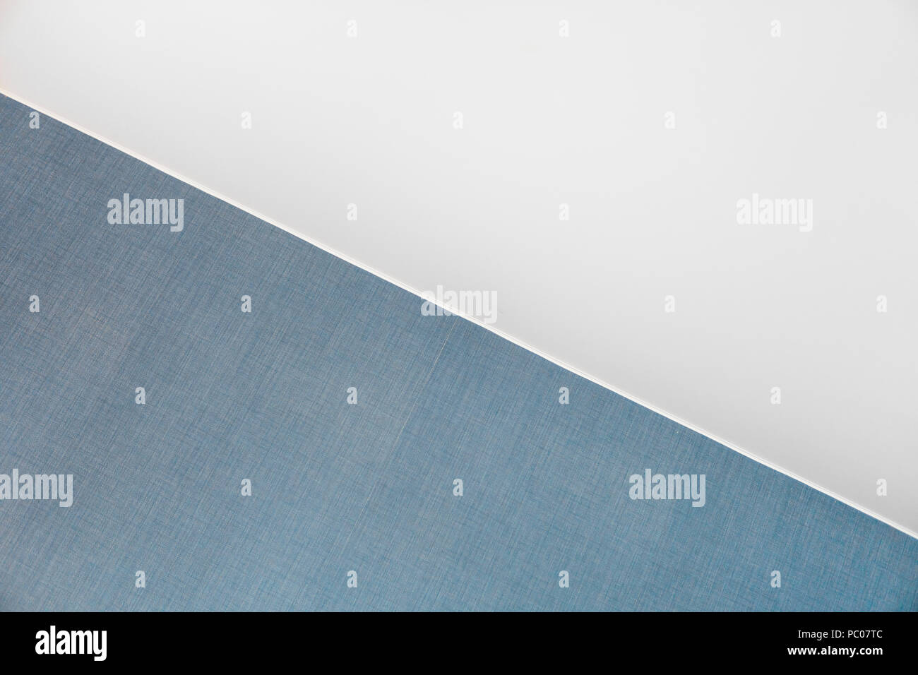 White ceils and blue wall with a corner in the interior Stock Photo - Alamy