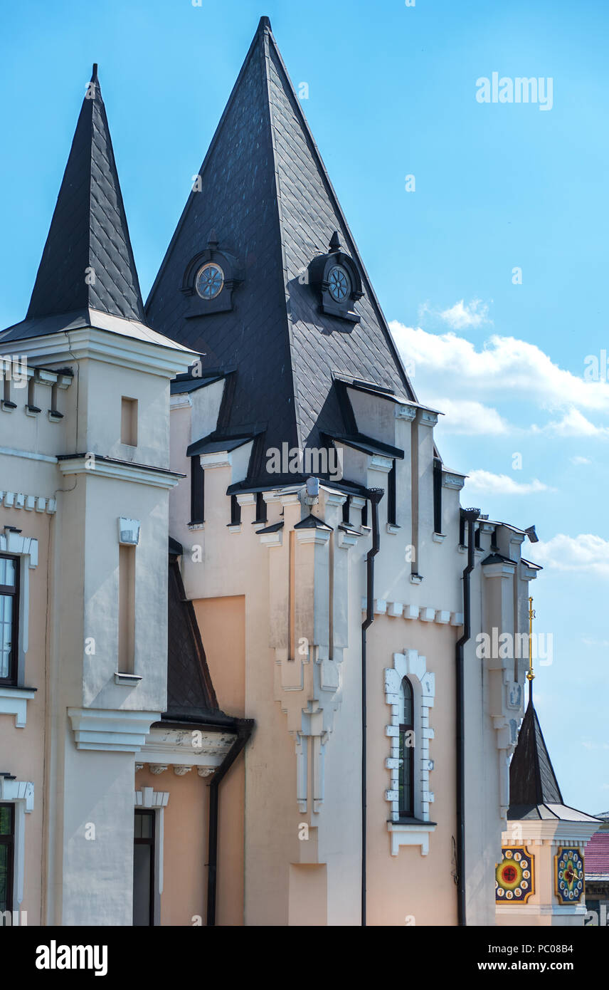 Part of an ancient house in the form of a castle on a sunny day Stock ...