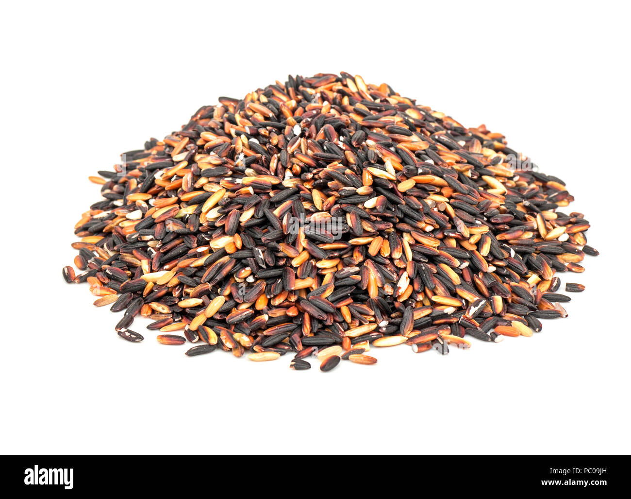 Pile of raw wild rice isolated on white background Stock Photo - Alamy