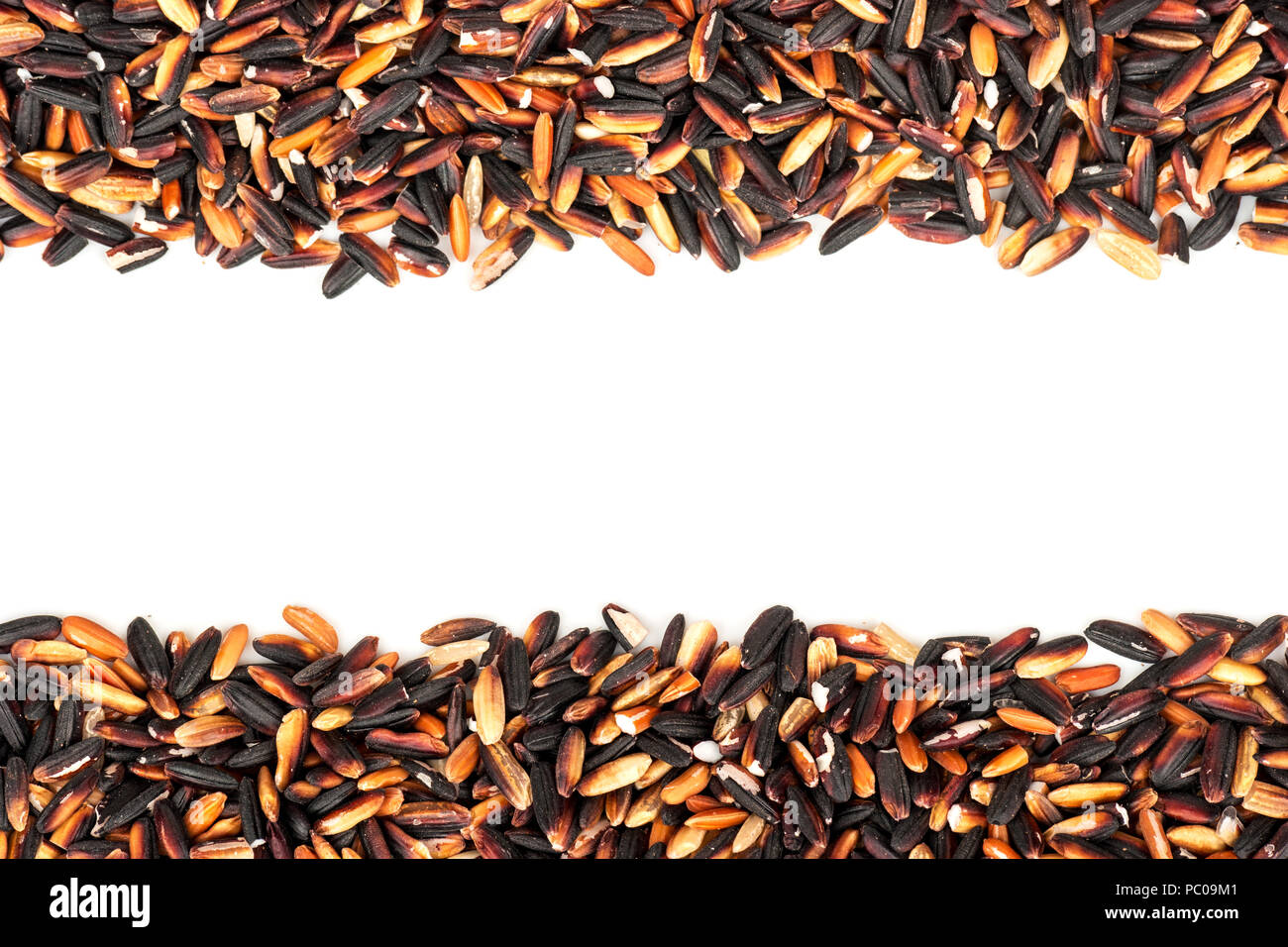 Scattered raw wild rice on white background, top view Stock Photo - Alamy