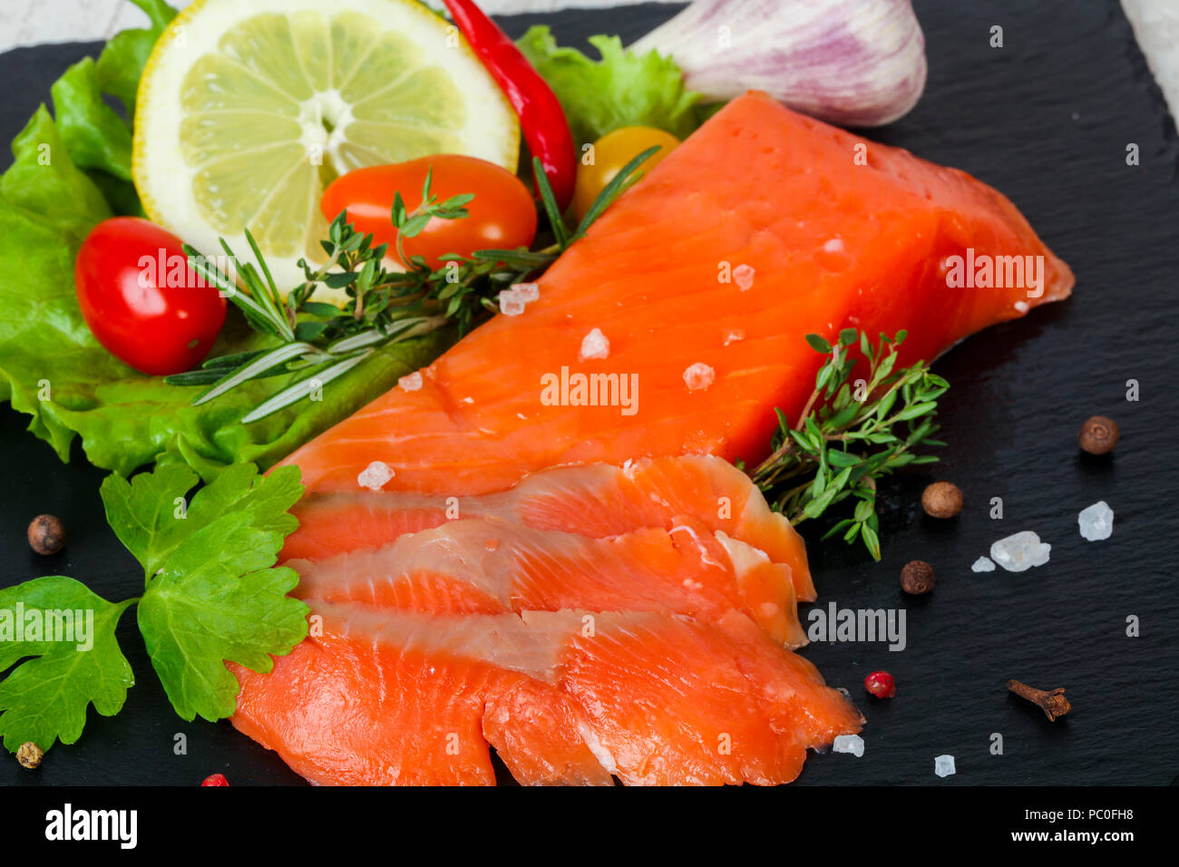 Raw trout fillet with salt and spices Stock Photo - Alamy