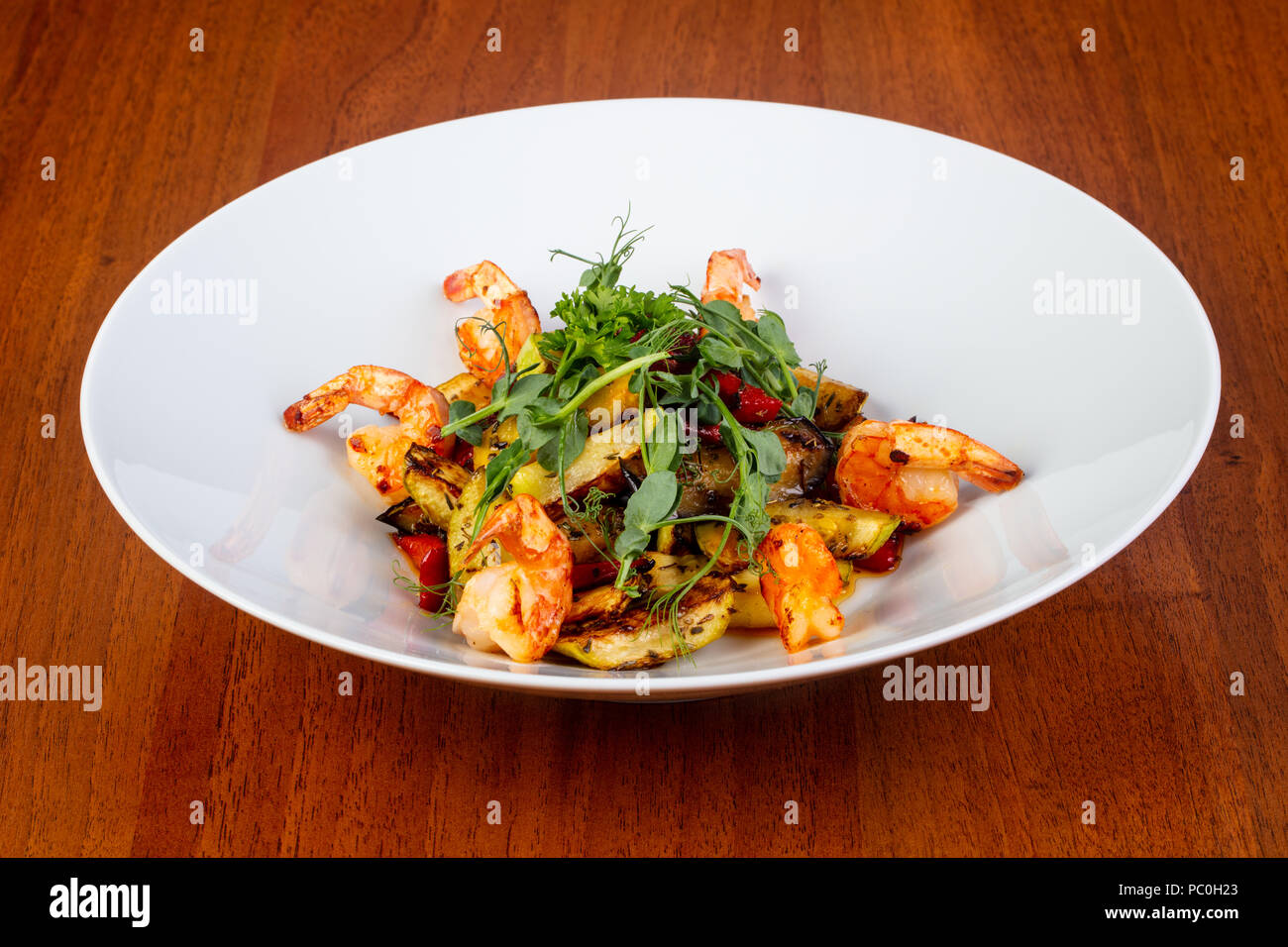 Delicious grilled tiger prawns with vegetables Stock Photo - Alamy