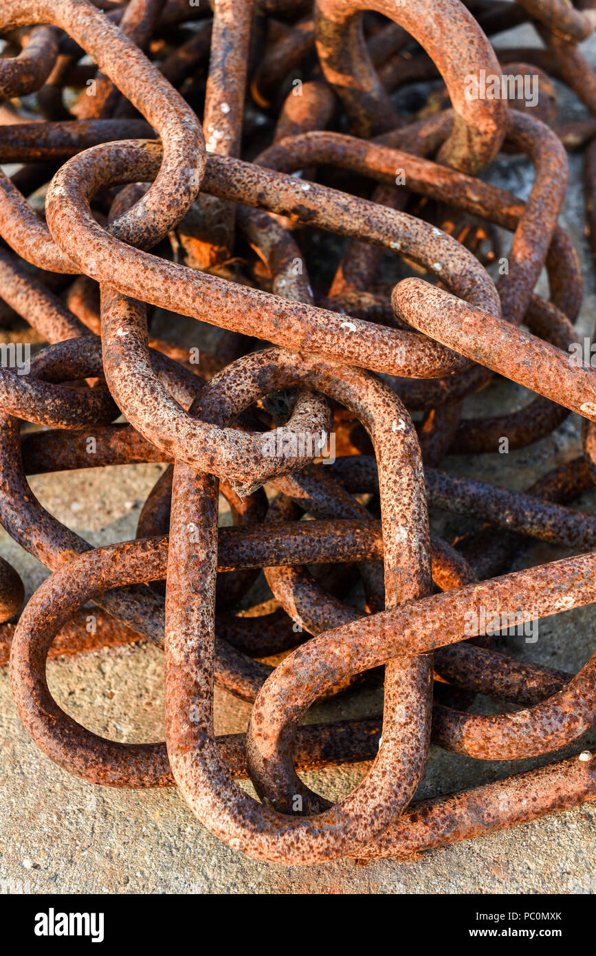 Old and rusty harbor chains Stock Photo - Alamy