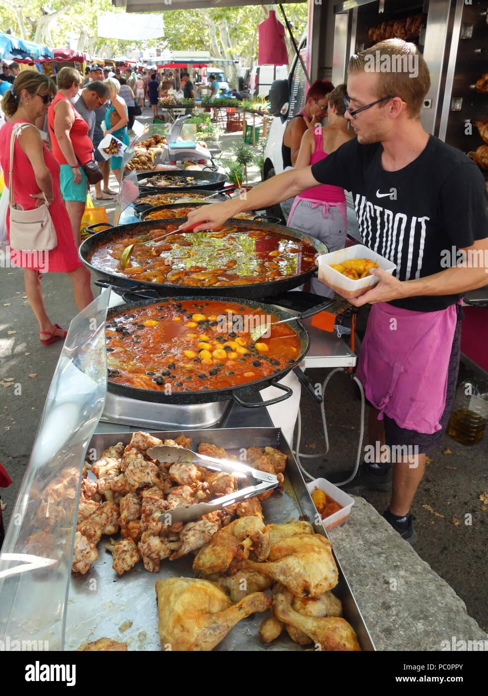 Colourful busy market at Saint Chinian french market Stock Photo - Alamy