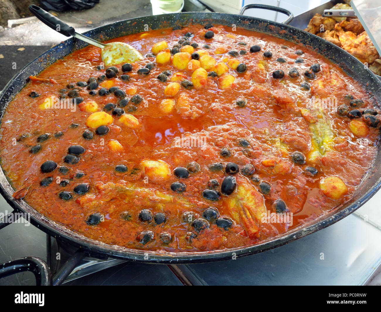 Colourful busy market at Saint Chinian Stock Photo - Alamy
