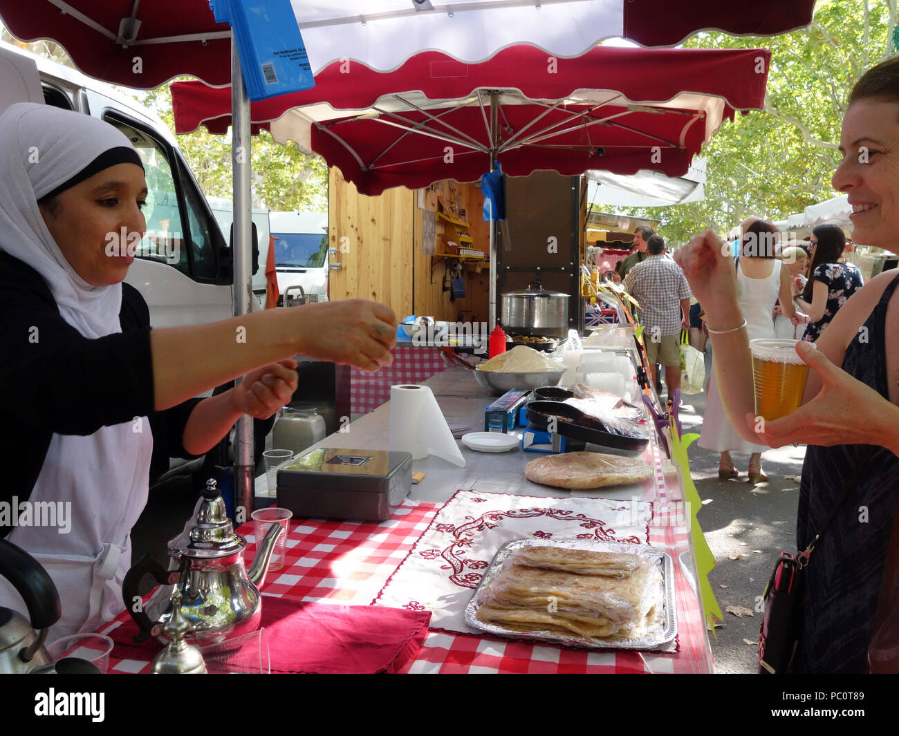 Colourful busy market at Saint Chinian french market Stock Photo - Alamy