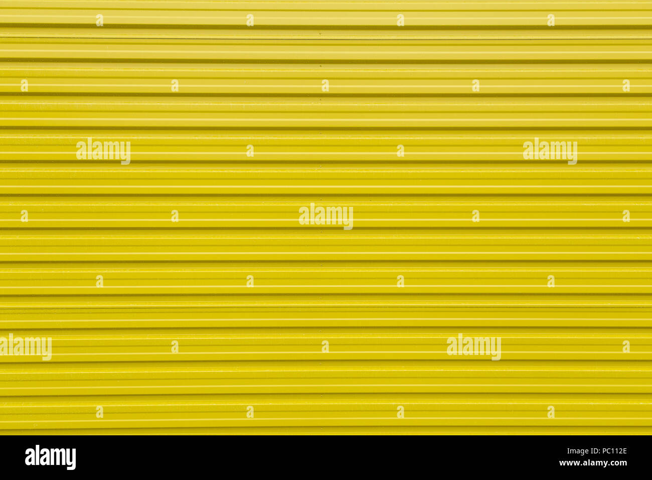 Yellow garage metal wall background Stock Photo - Alamy
