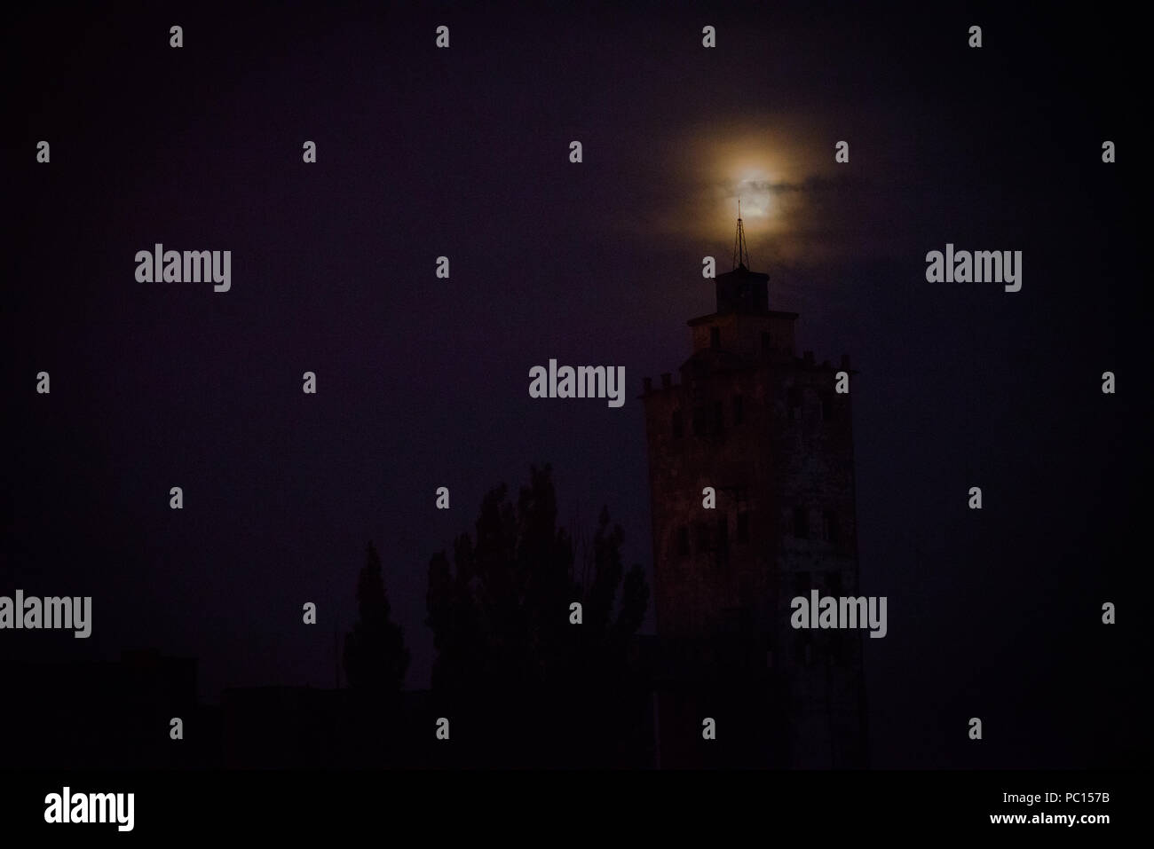 A night view with the Moon Stock Photo - Alamy