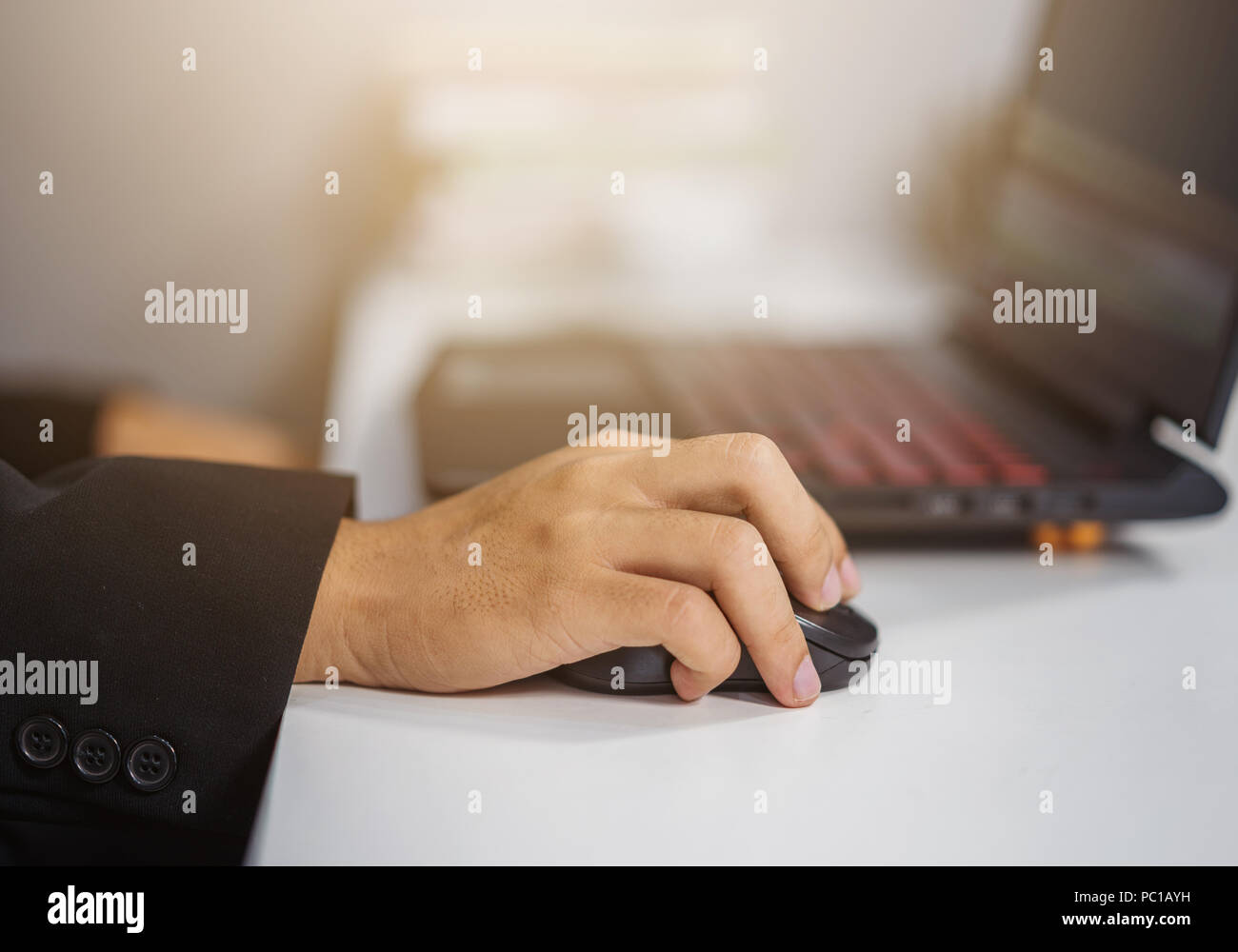 hand clicking mouse of laptop computer Stock Photo - Alamy
