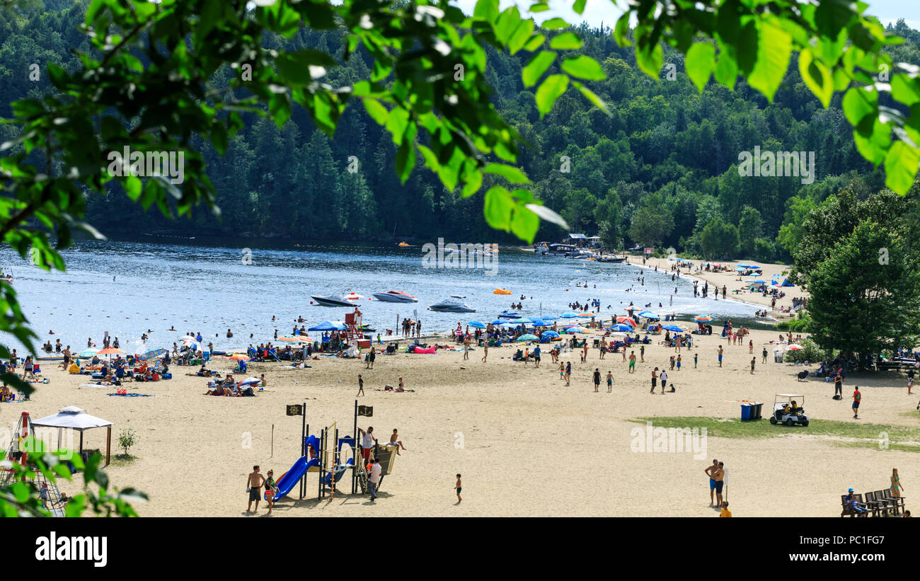 Lac-Simon, Quebec, Canada – July 29, 2018: People enjoy a sunny day on ...