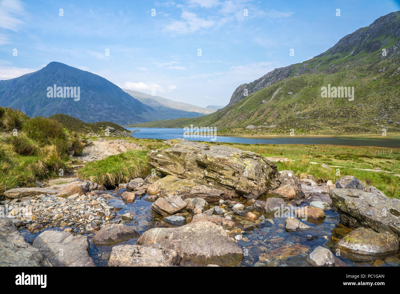 Llyn Idwal is a small lake that lies within Cwm Idwal in the Glyderau ...