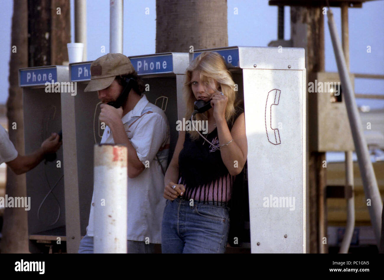People using public pay phones in Los Angeles, California, 1984 Stock ...