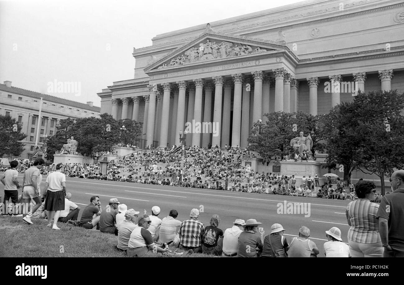 Crowd watching the 4th of July parade in Washington DC, 1982, in front ...