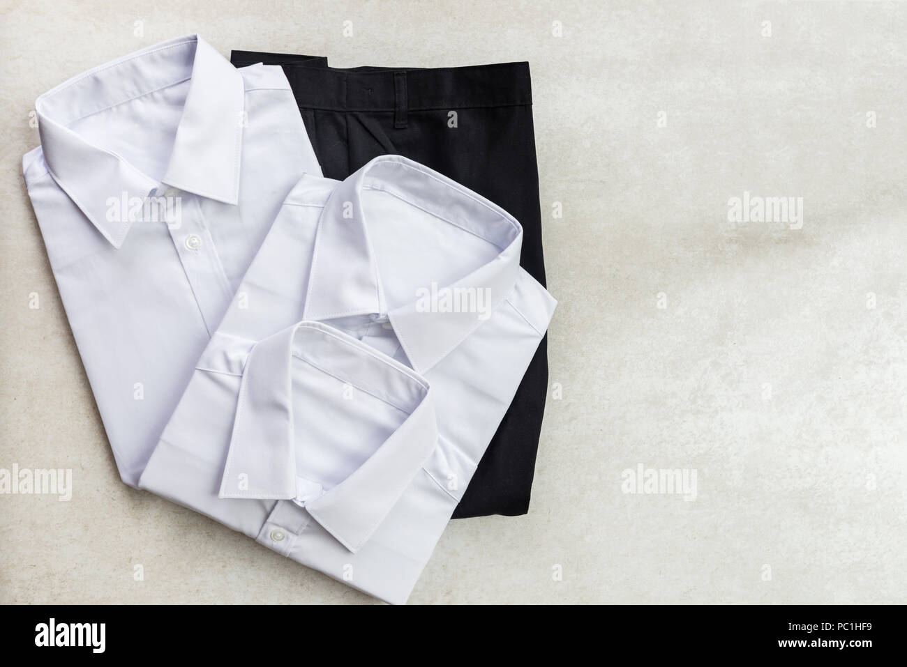 Back to school concept, school uniform such as white shirts and ...