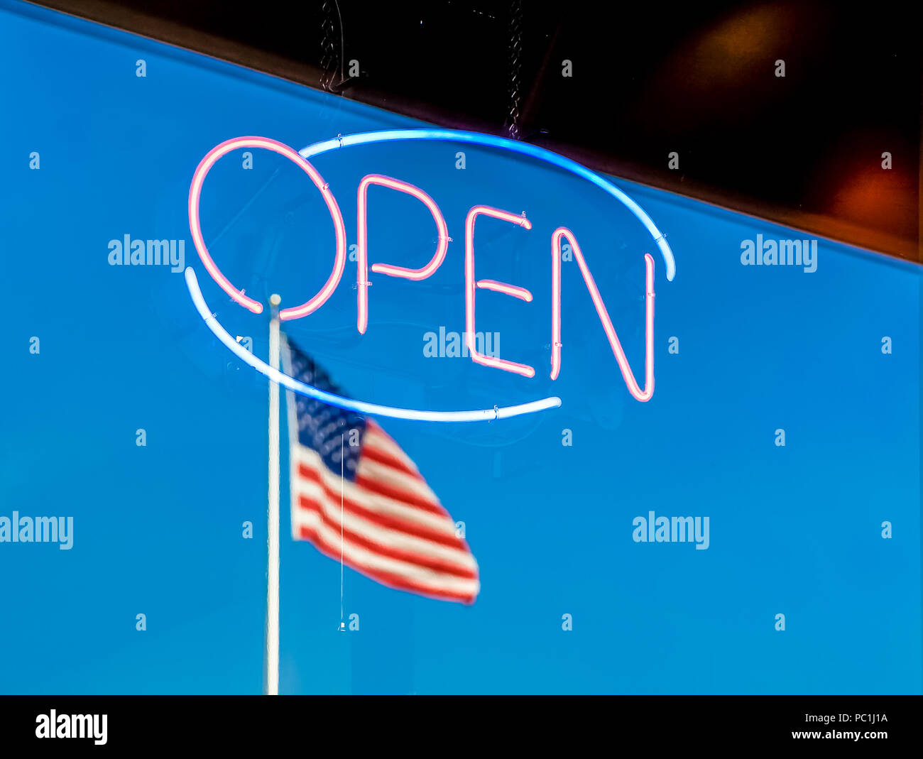 Open Sign and Flag Stock Photo - Alamy
