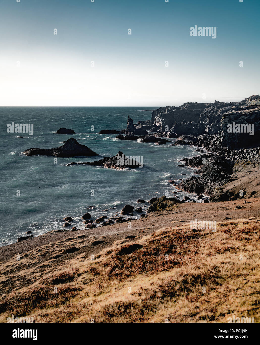 Typical Icelandic sunrise sunset cliff landscape at Arnarstapi area in ...