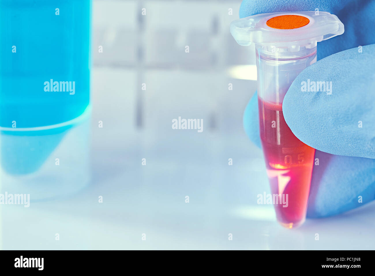 Science and molecular biology background with text space. Plastic tube ...