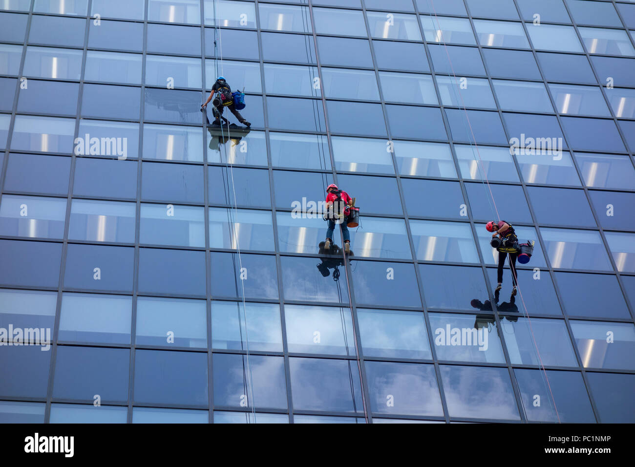 By rappelling down building hi-res stock photography and images - Alamy