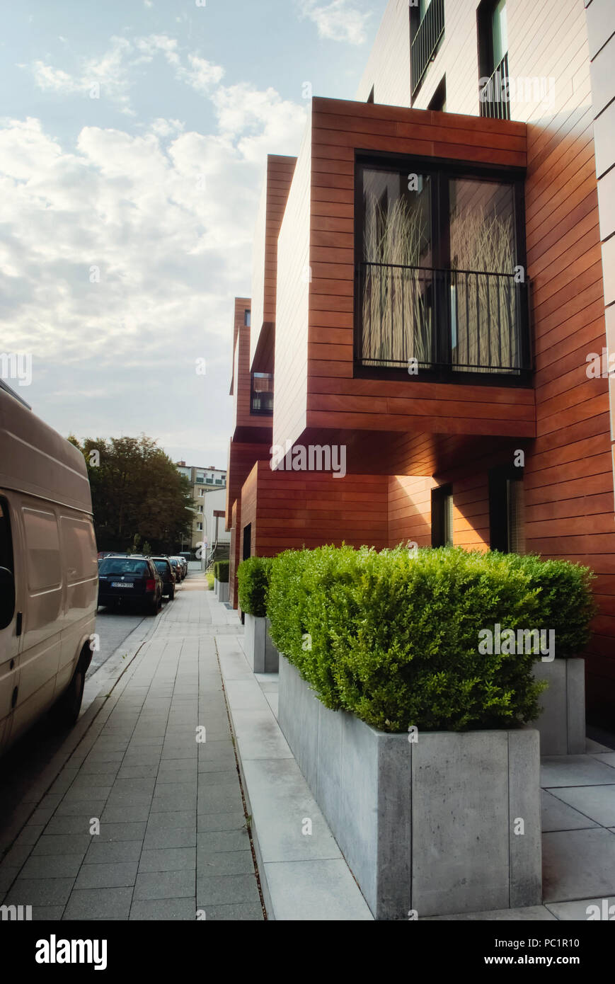 Modern contemporary wood sided building Stock Photo - Alamy