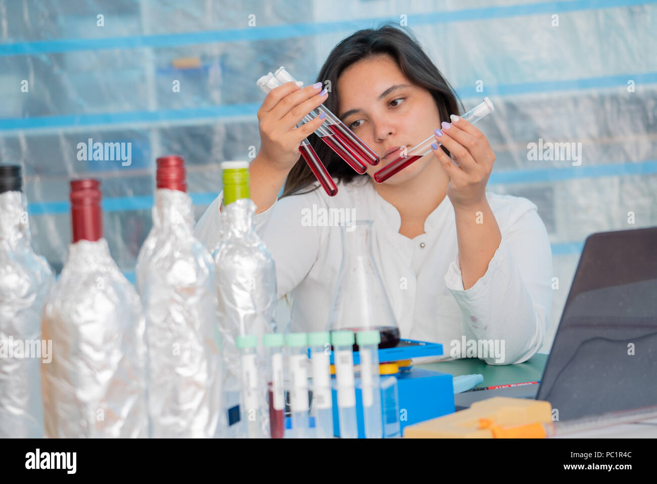 bottle of wine in the quality control laboratory Stock Photo - Alamy