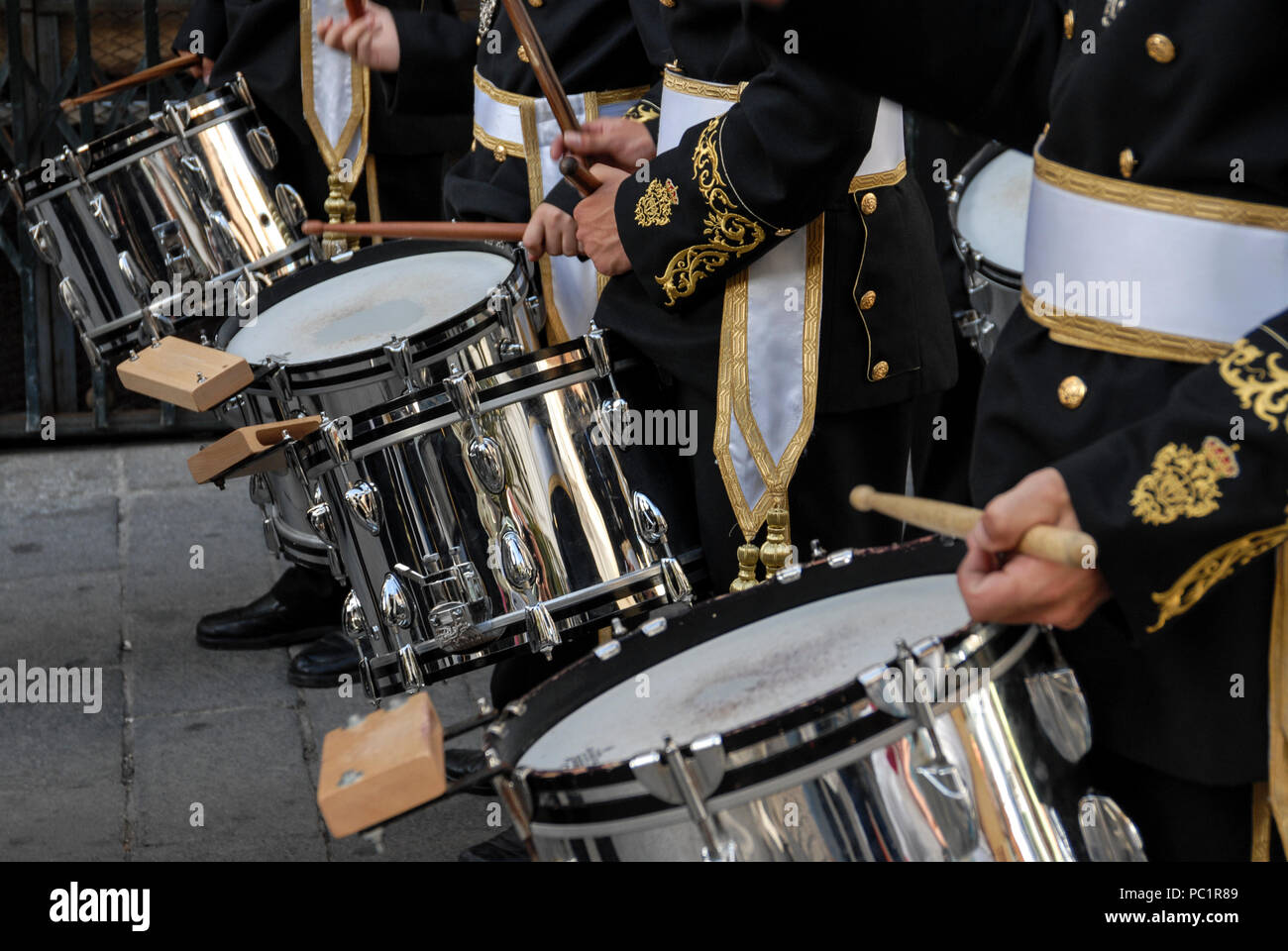 A band leading the Easter religious procession through the crowed ...
