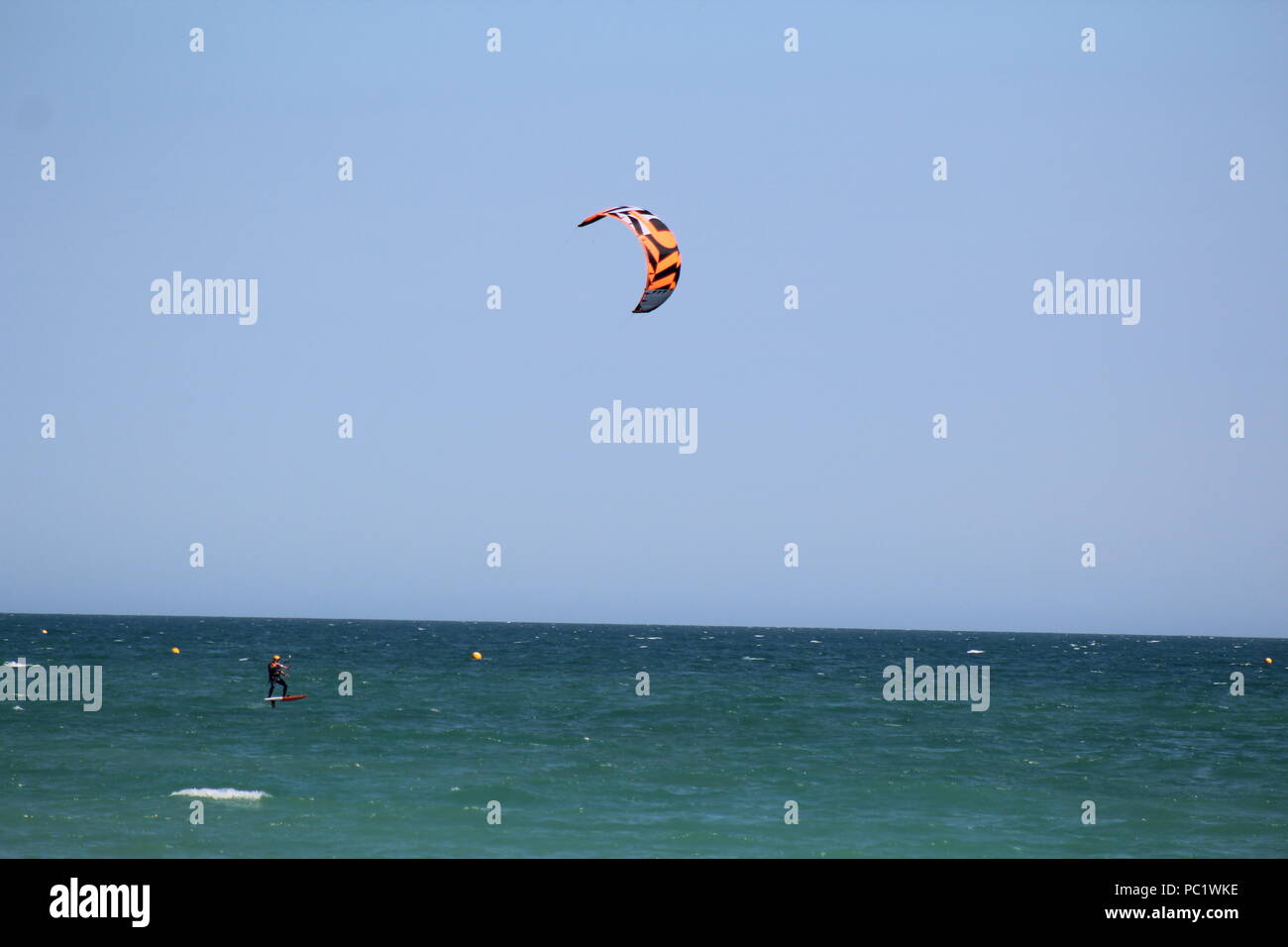 kite surfer off goring by sea Stock Photo - Alamy