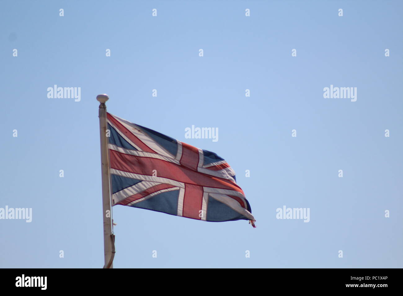 Union Jack Flag Flapping In The Wind High Resolution Stock Photography ...