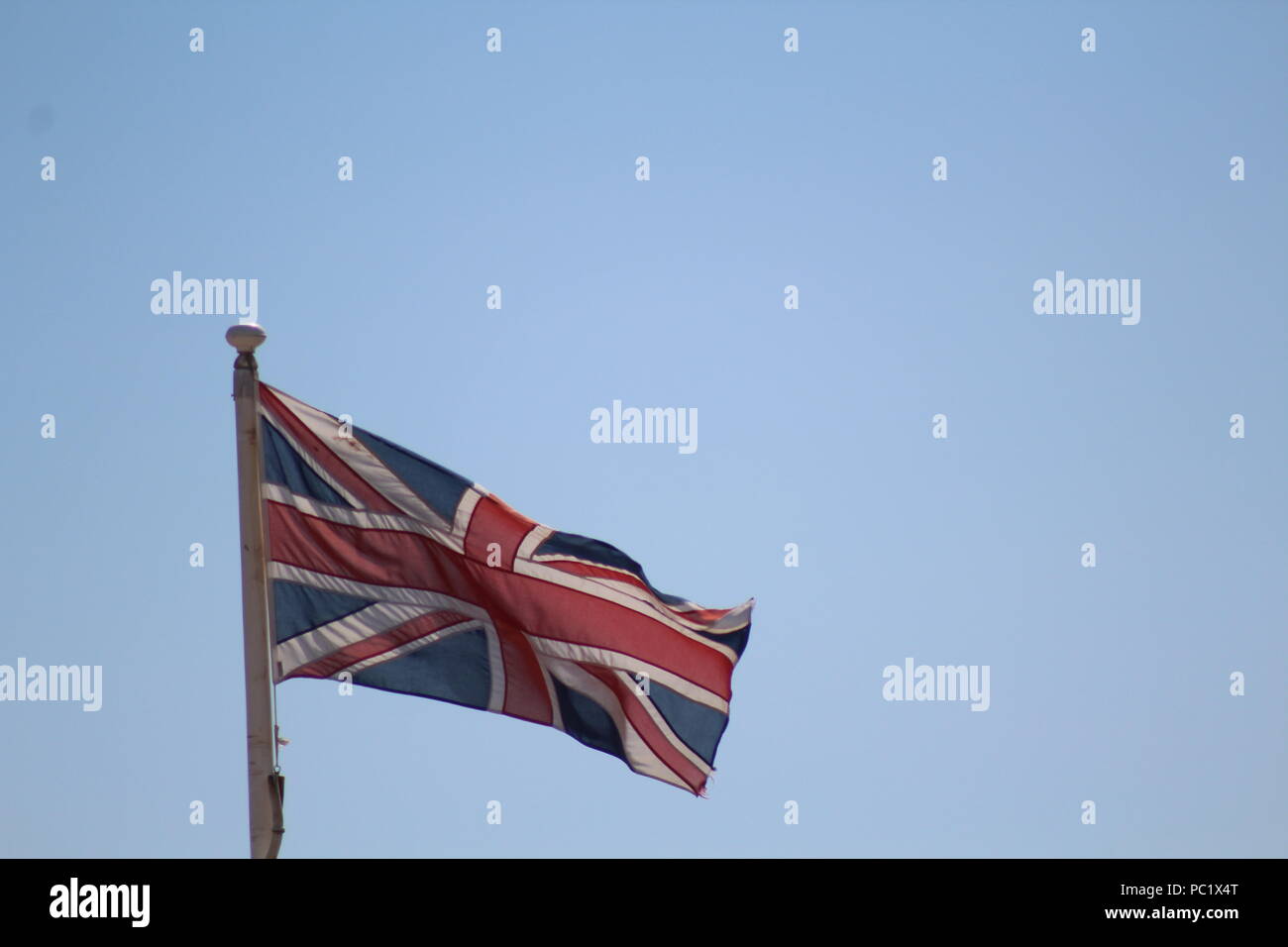 Flag pole flying hi-res stock photography and images - Alamy