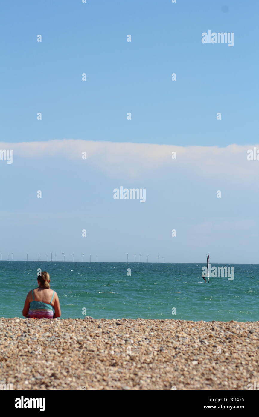 Wind surfer on beach hi-res stock photography and images - Alamy