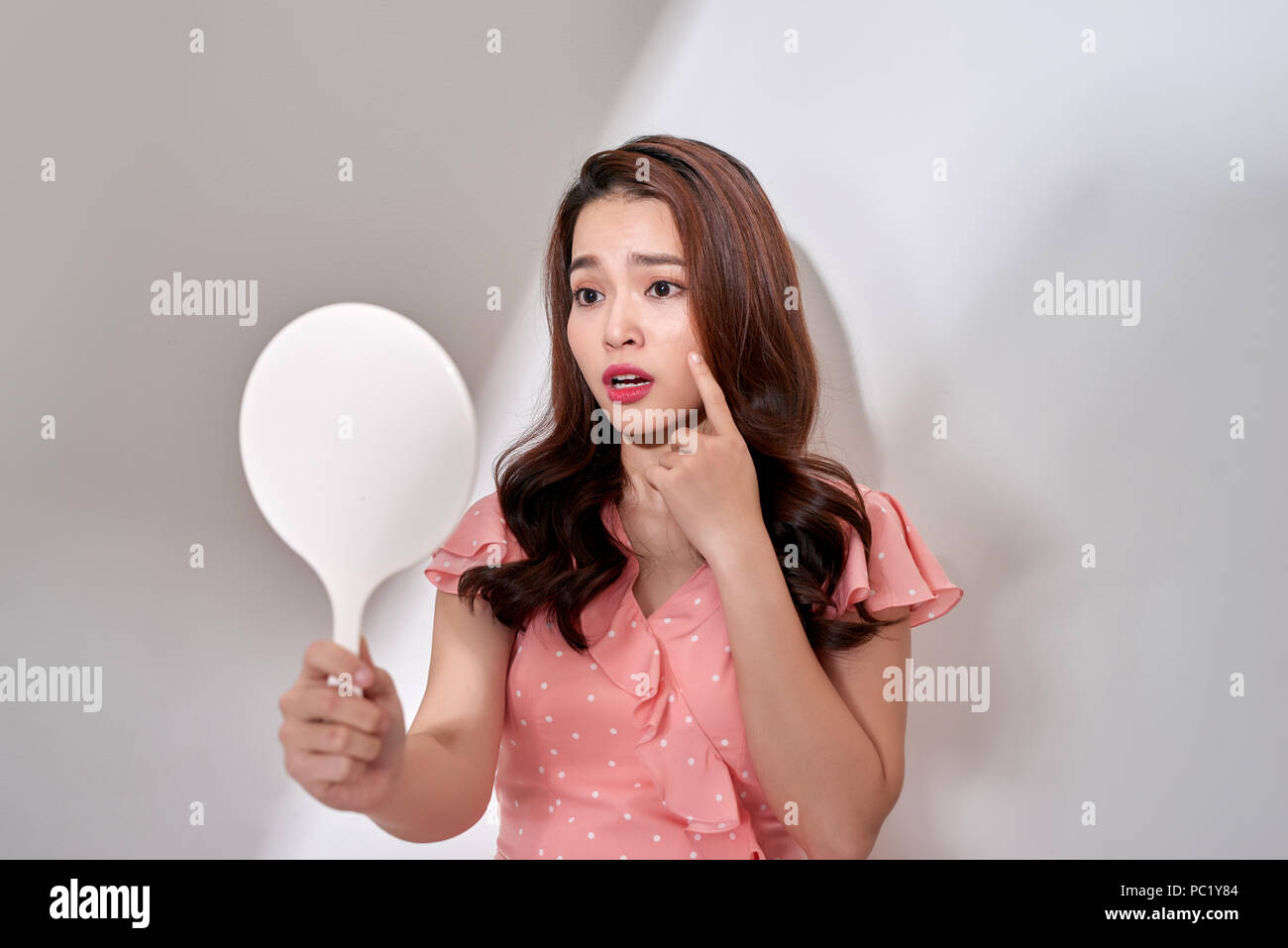 Young woman having skin problems Stock Photo - Alamy