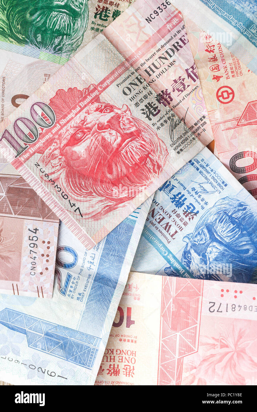 Hong Kong dollars, colorful banknotes close-up, vertical background ...