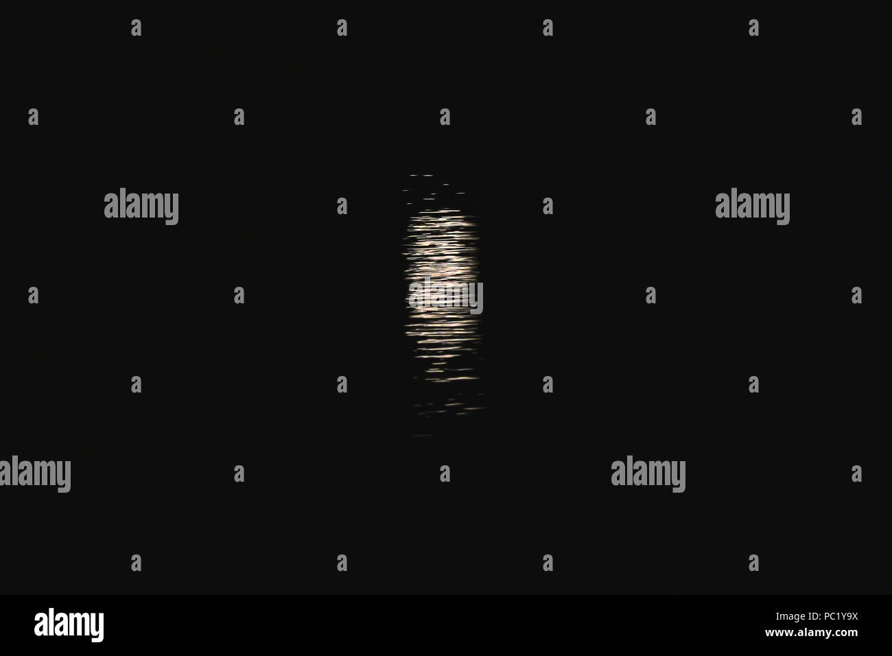 Reflection of the moonlight on the water Stock Photo - Alamy