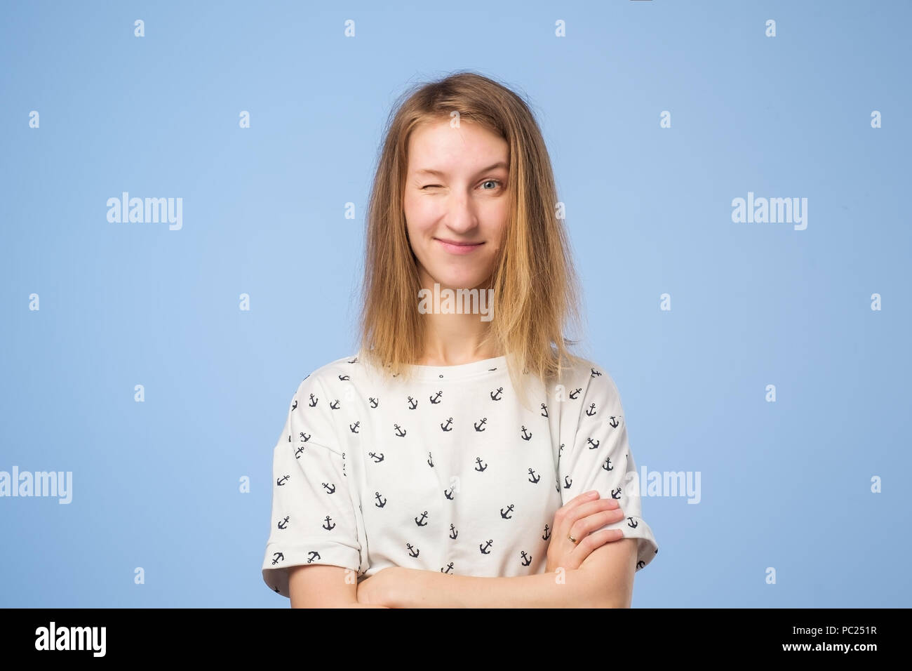 Woman winking and smiling hi-res stock photography and images - Alamy