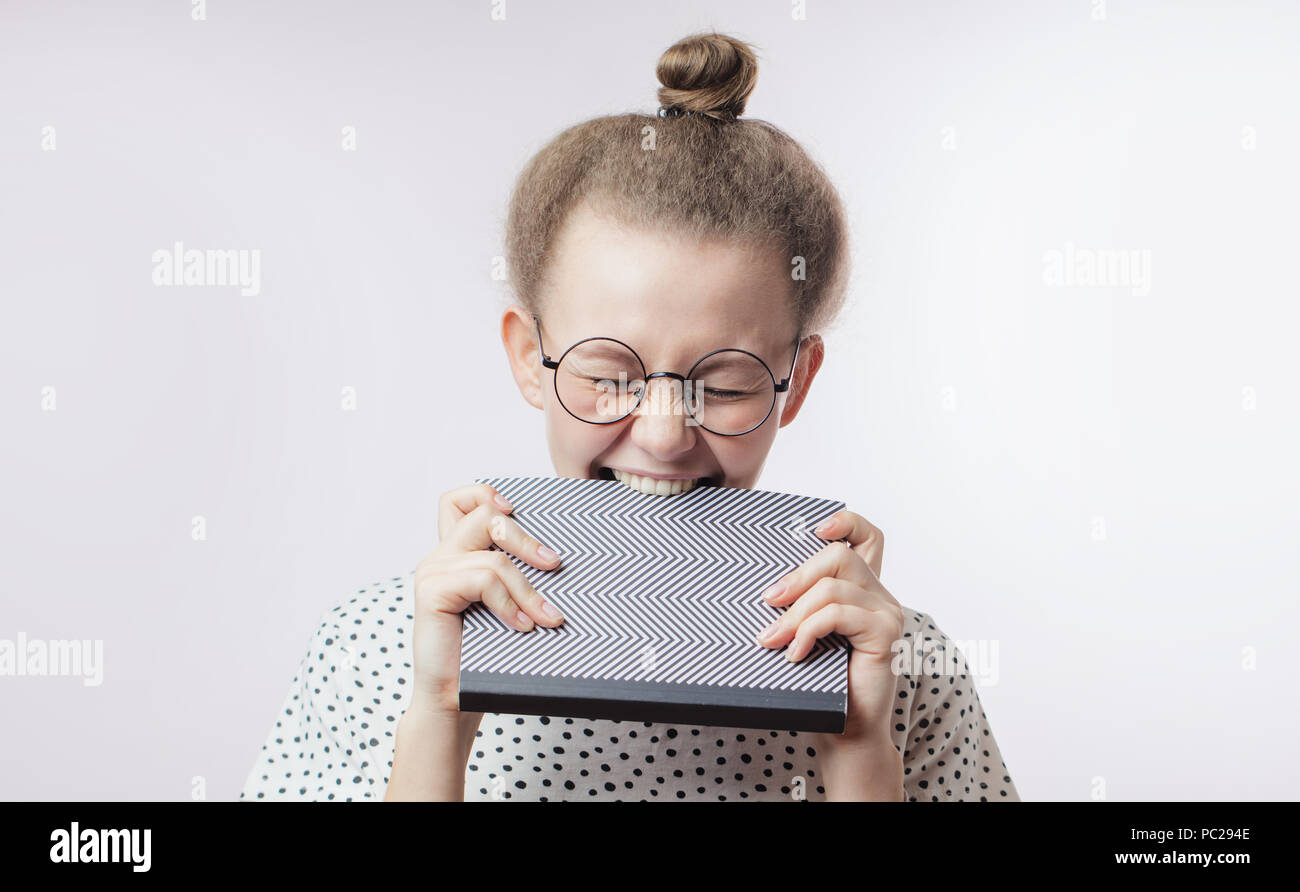 crazy student trying to taste the book. madness because of difficult ...